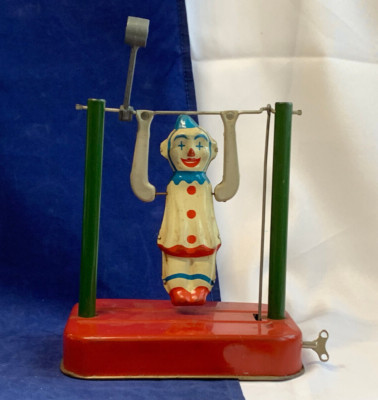 Vtg Wind-Up Tin Litho Clown Flipping on a Gymnastics High Bar Toy w ...
