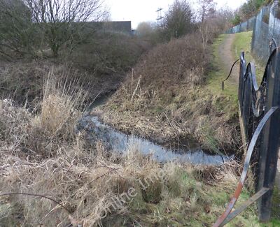 Photo 12x8 Cut Through Clock Face Footpath from Sutton Manor leading to ...