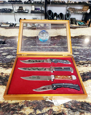 FOUR COLLECTOR'S HUNTING KNIVES IN DISPLAY CASE | eBay