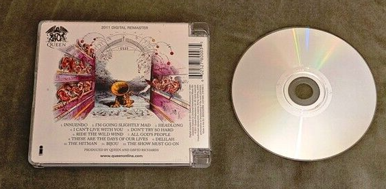 QUEEN - INNUENDO - SIGNED CD - BRIAN MAY AUTOGRAPH (LP VINYL 7" 12 ...