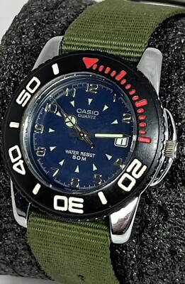 Vintage Casio Black & Red Bezel 50M Diver Date Watch (1342) MTP-3002 ...