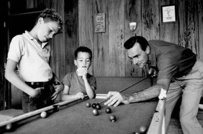 Dennis Weaver plays pool with his sons Rick Weaver and Robby Weaver ...