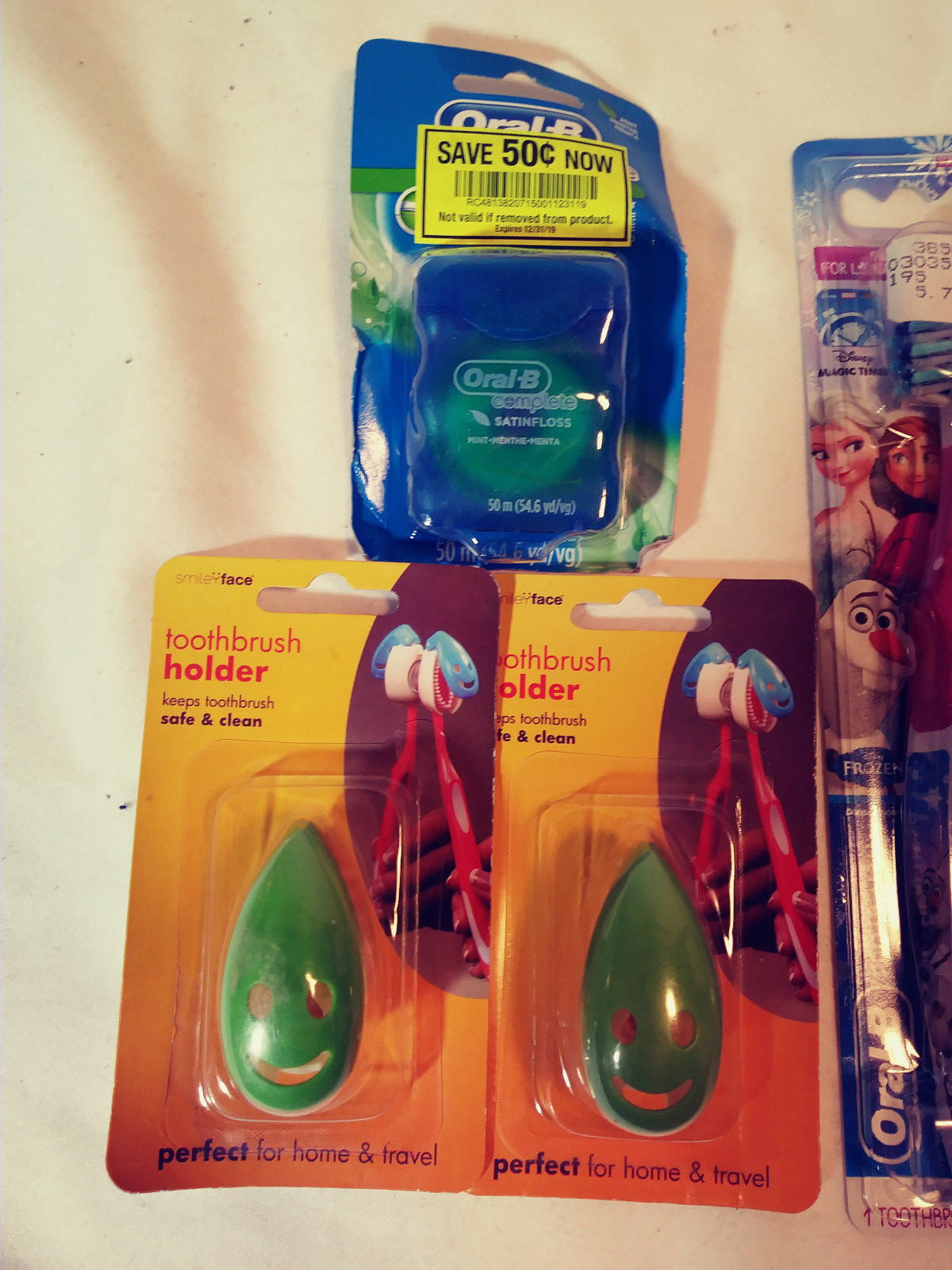 COLGATE / ORAL B LOT OF 4 TOOTHBRUSHES / FLOSS & 2 TOOTHBRUSH HOLDERS ...
