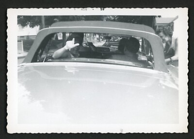 Woman Face Obscured By Hand Pointing Out of Car Rear Window 1950s ...