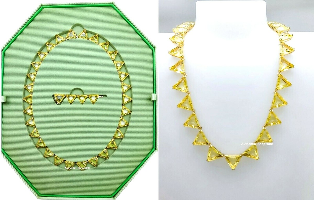 New 100% Authentic SWAROVSKI Yellow Gold Triangle Cut New 100% Authentic SWAROVSKI Yellow Gold Triangle Cut