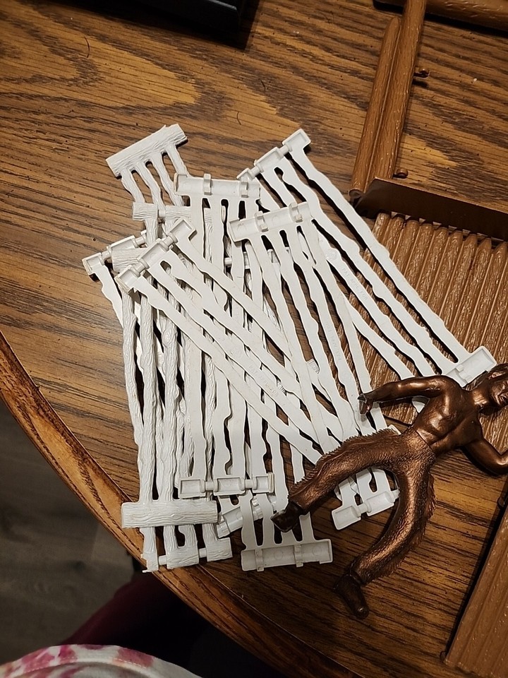 Fort Apache Gate And Log Fence, With White Fencing And An Indian Figure ...