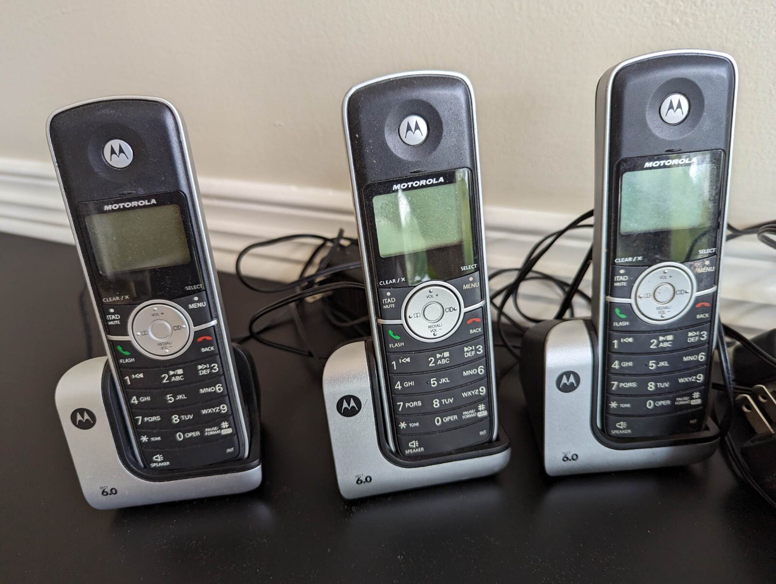 Motorola Model L404 with 4 cordless phones and bases | eBay