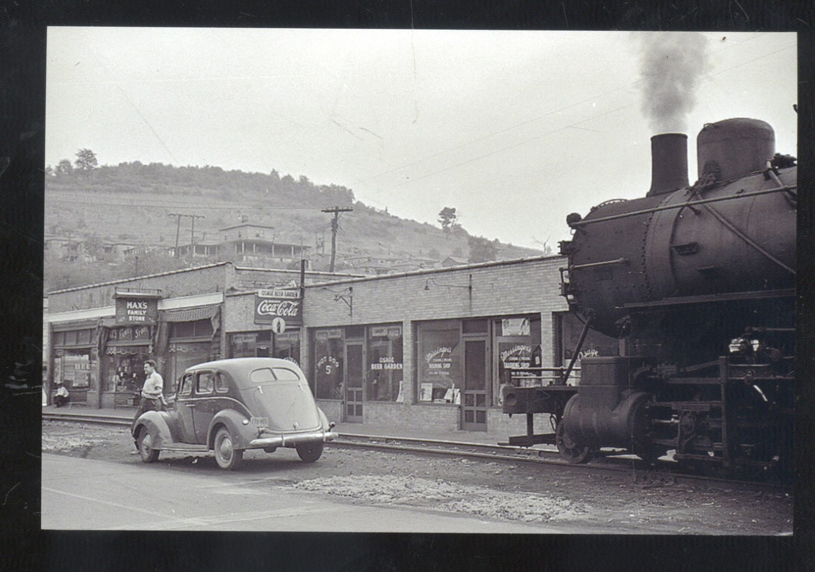 REAL PHOTO OSAGE WEST VIRGINIA DOWNTOWN STREET SCENE TRAIN POSTCARD ...