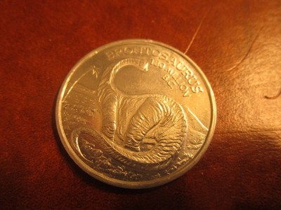 BRONTOSAURUS AGE OF THE DINOSAUR TOKEN | eBay