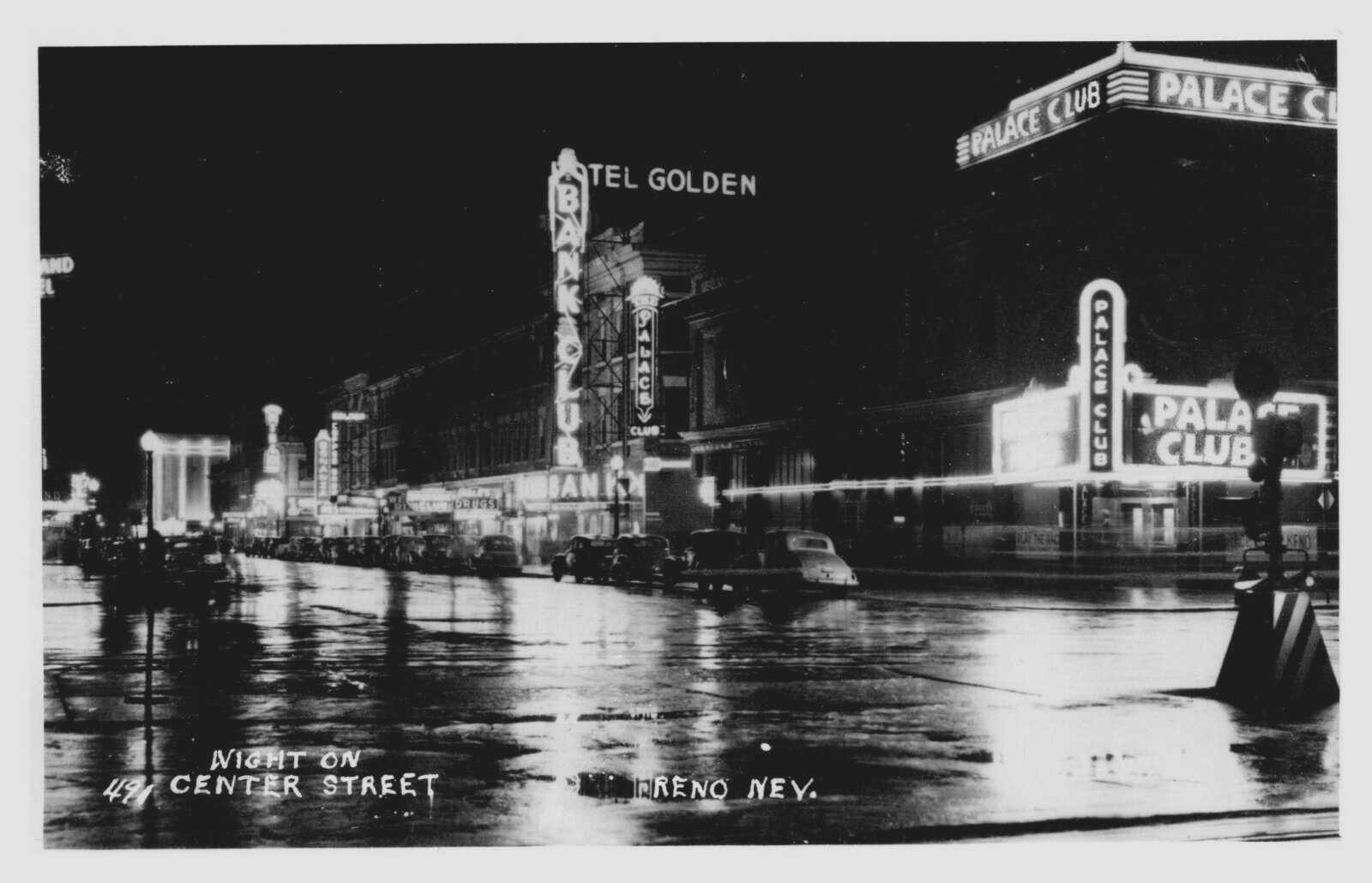 Early Reno Nevada Neon Wet Street 1940s Cars Palace Hotel GOlden Drug ...