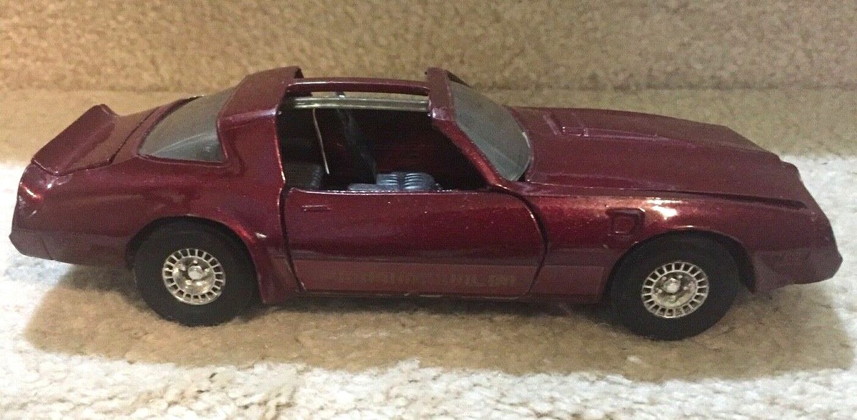 Maroon Firebird Car