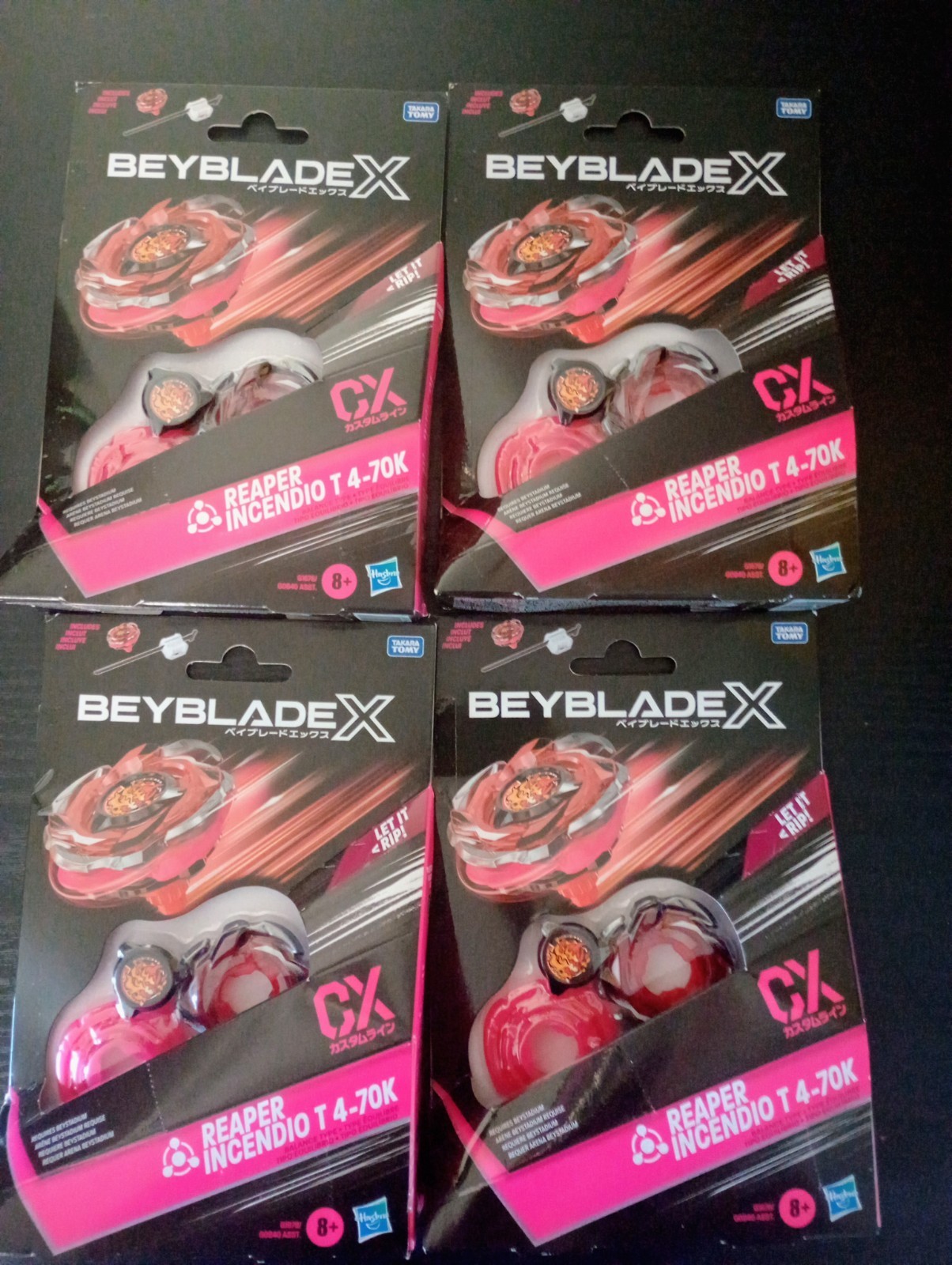 Four Beyblade X Reaper Incendio T 4-70K CX and Launchers | eBay