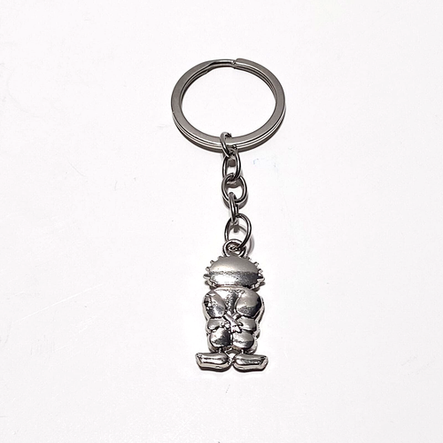 A metal key holder in the shape of the Palestinian character Hanzala ...