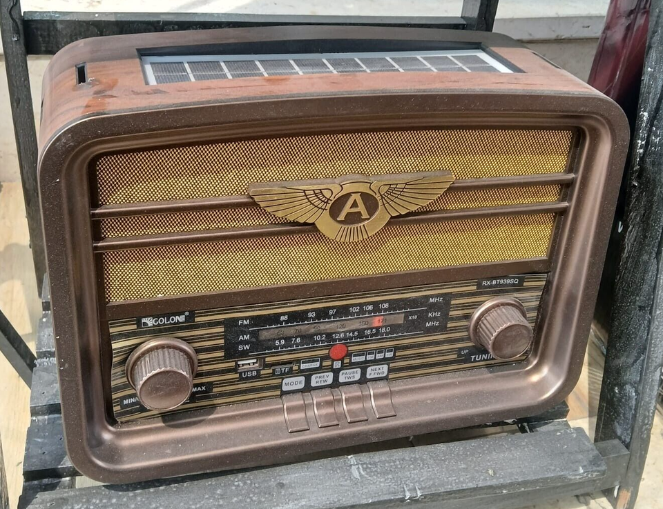 Antique portable radio, modern manufacture, battery operated Or solar ...