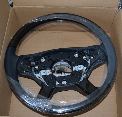 Original Mercedes w221 wooden steering wheel in front of pot heated ...