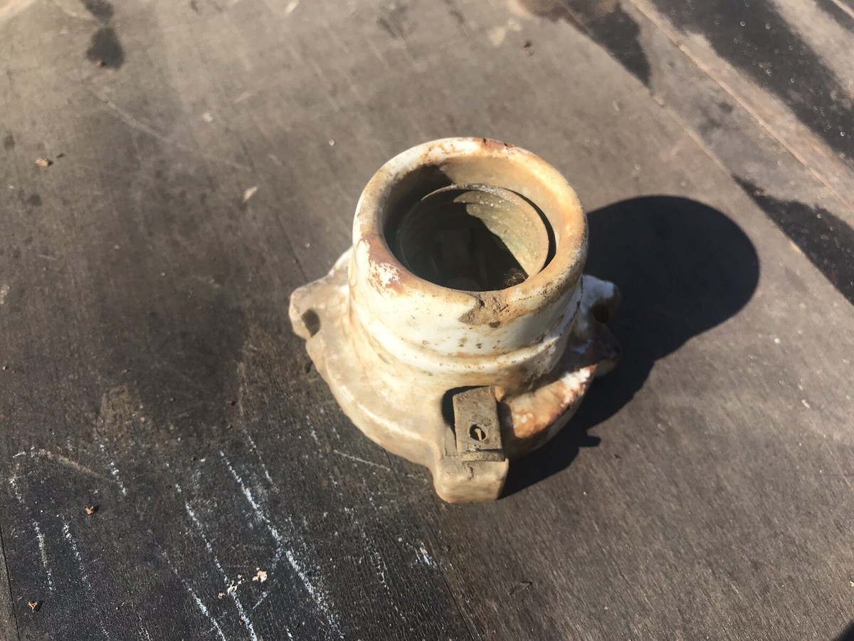 Broken Light Fixture In Porcelain