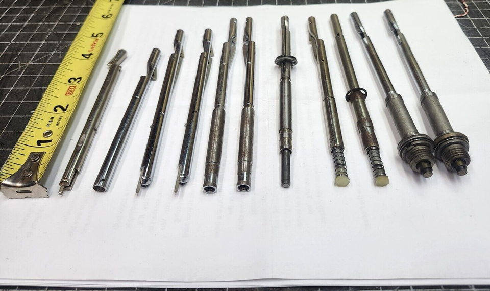 Eleven of the STACKING SPINDLES. DIFFERENT TYPES AND STYLES, BRAND ...
