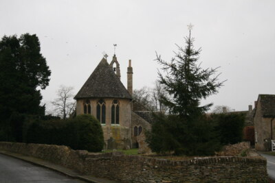 Photo 6x4 St. Peter's Church, Filkins Facing the rather unusual rounded ...