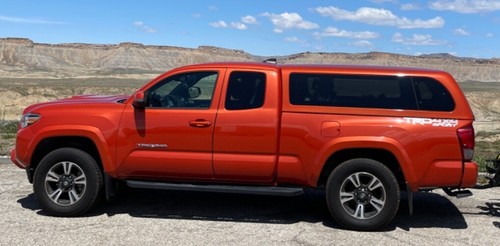 Snugtop camper shell for Toyota Tacoma 6' bed. Color: inferno (burnt ...