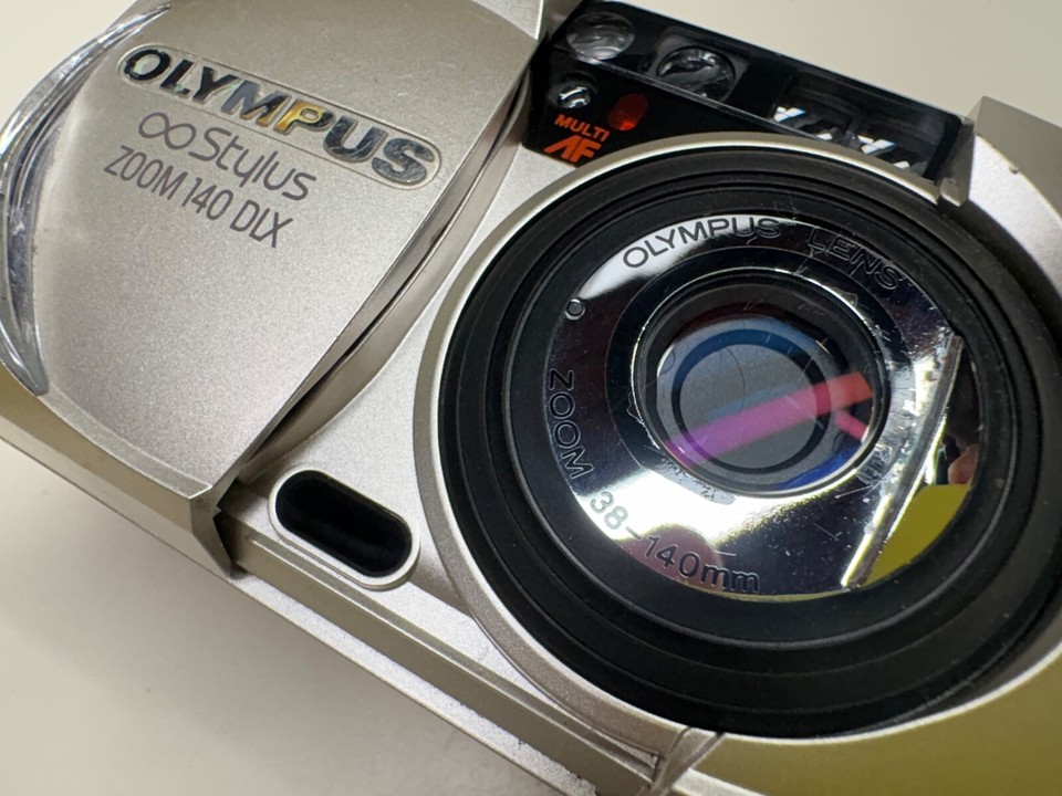OLYMPUS STYLUS ZOOM 140 DLX 35MM FILM CAMERA 38-140MM WORKING | eBay