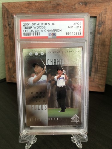 2001 SP Authentic Tiger Woods Rookie Focus on A Champion PSA 8 Golf Rc ...
