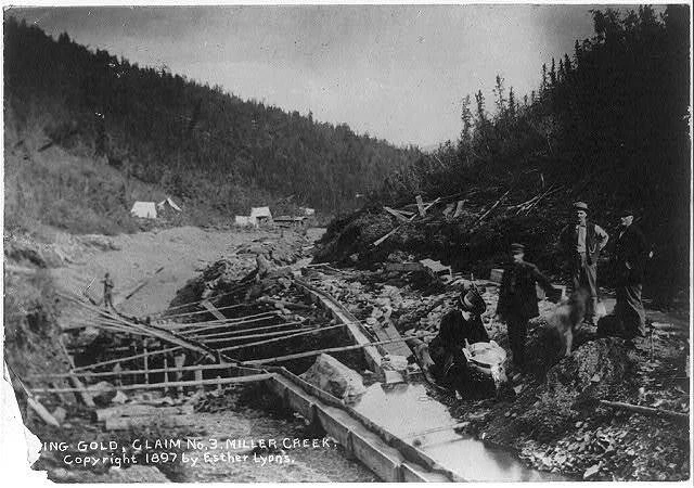 Men Mining Gold