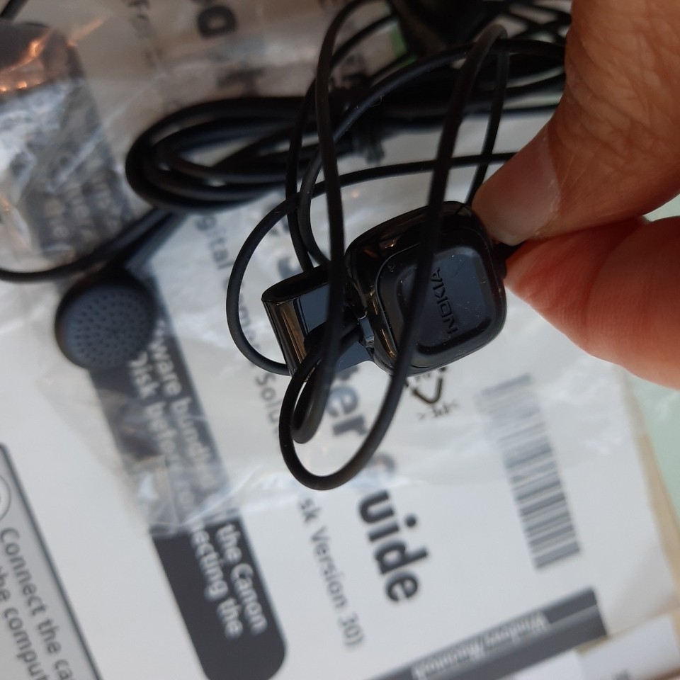 Canon IXUS 70 CD User Guide AV Cable SD Card iPAD Camera Connector ...