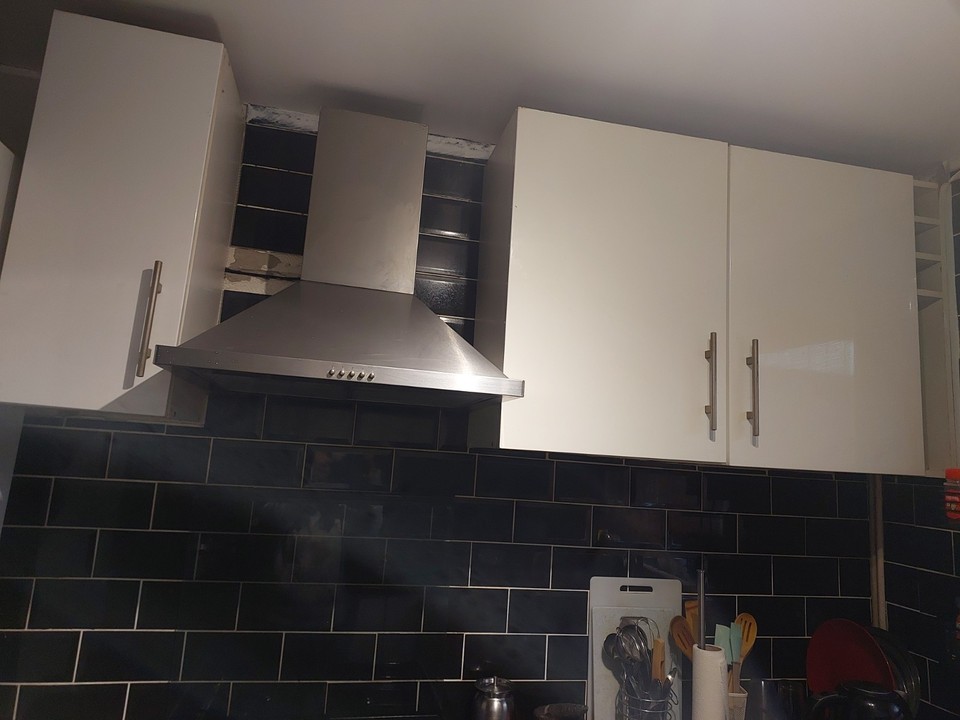 Kitchen cabinets, Worktop, basin, gas hob, fridge-freezer and extractor ...