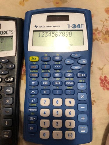 2 Texas Instruments (TI-34 II & TI30X IIS) Scientific Calculators. Used ...