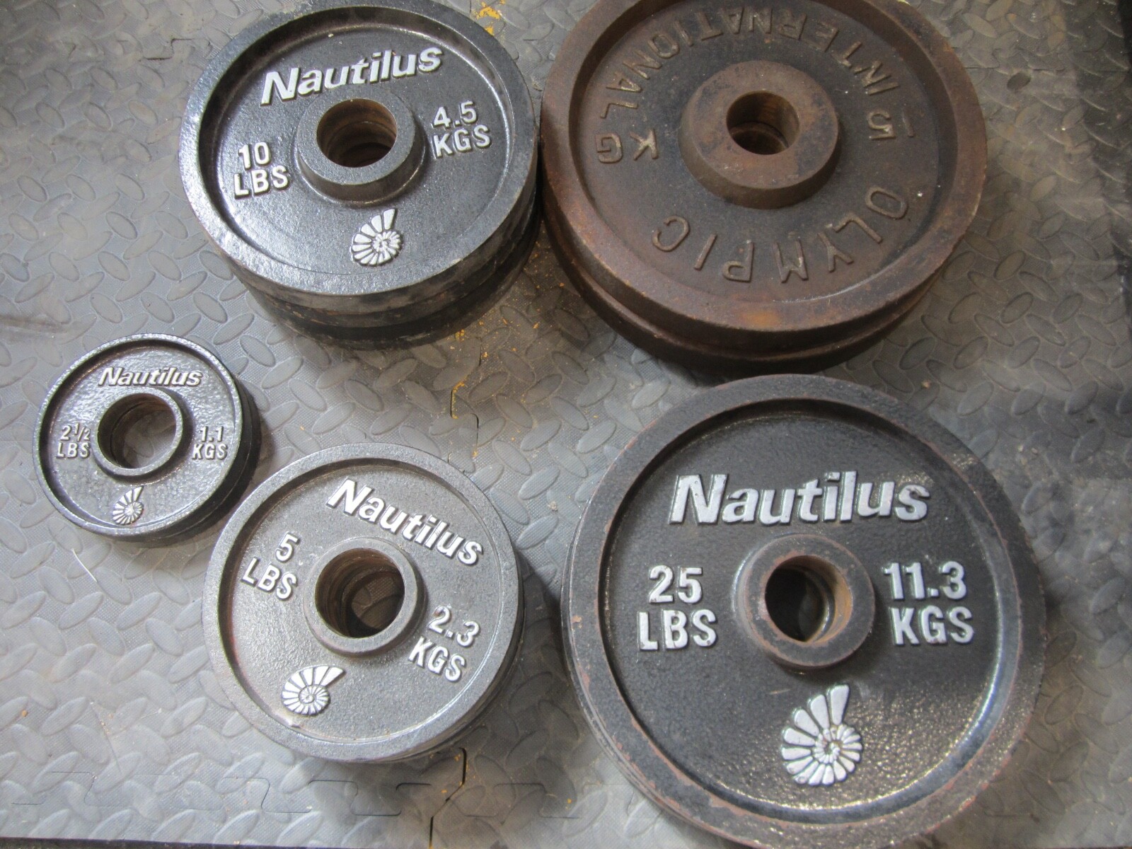HEAVY DUTY NAUTILUS OLYMPIC WEIGHTS | eBay UK