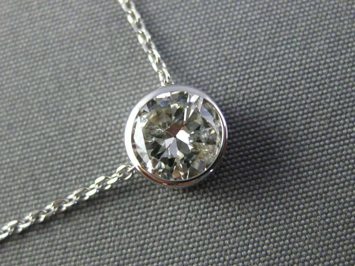 Floating Bezel Set Diamond Pendant S.H Zell & Sons Now Carries This
