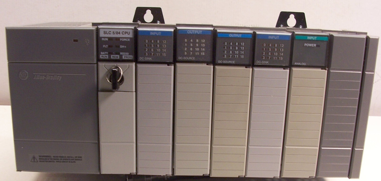 Allen Bradley SLC 500.. 7 SLOT RACK, WITH SOME MODULES, UNTESTED, (NO ...