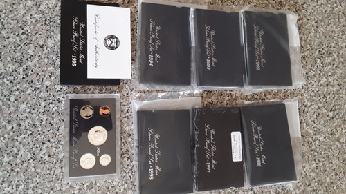1992-1998 Silver Proof Sets 7 sets, 35 coins Each with COA's each year ...