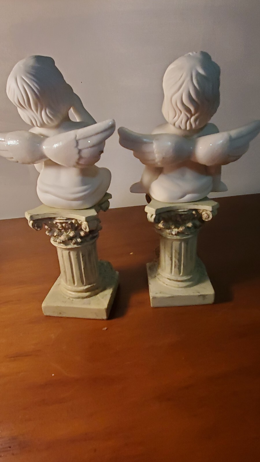 Set of White Cherubs On Beige Pedestals. Each Cherub Sitting on ...