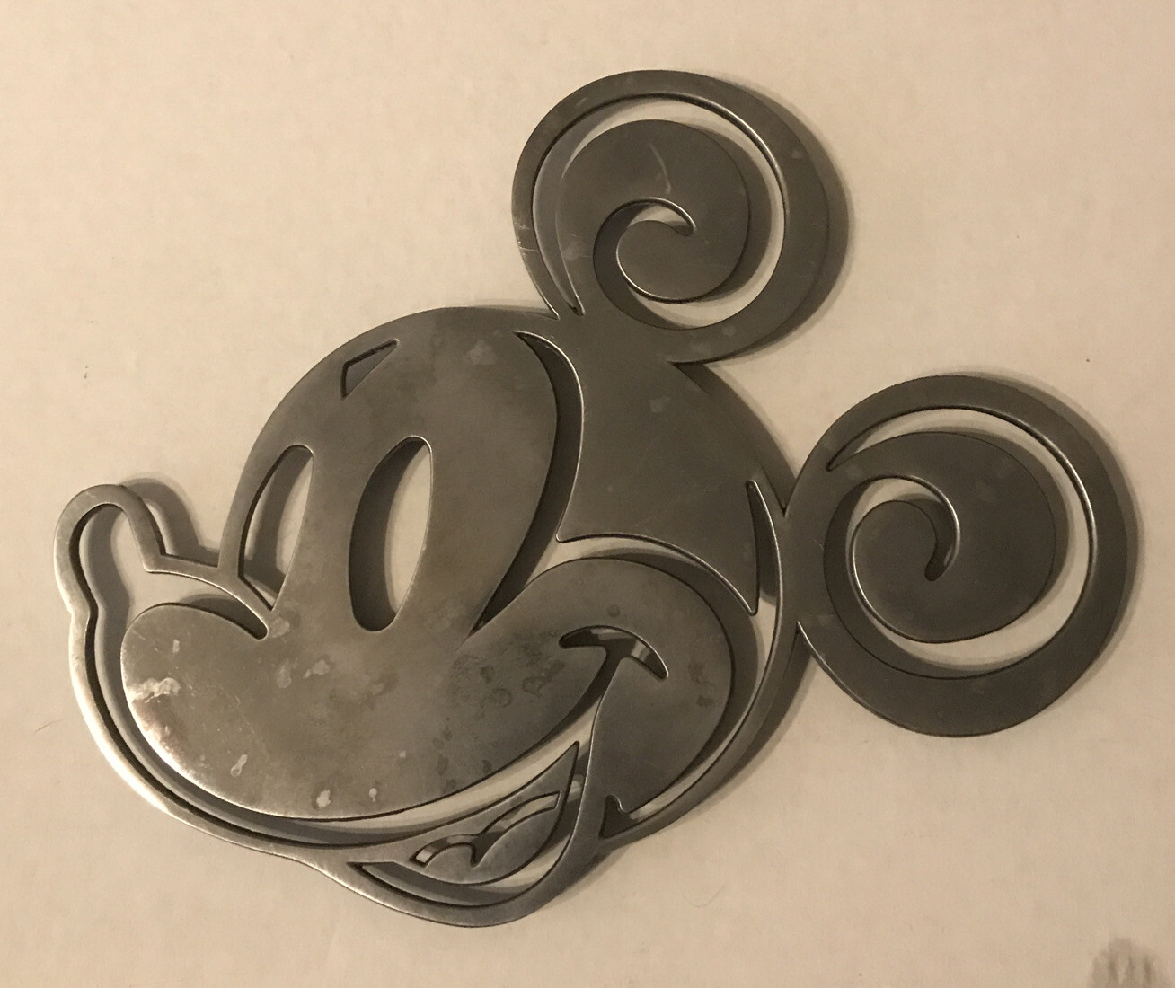 Silver metal Mickey Mouse trivet Good Condition measures approx. 9 ½" x ...