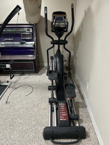Sole E35 elliptical machine, featuring its digital display panel, dual ...