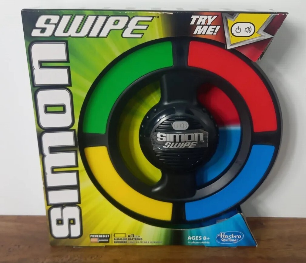 Hasbro Simon Swipe Electronic Game for sale online | eBay