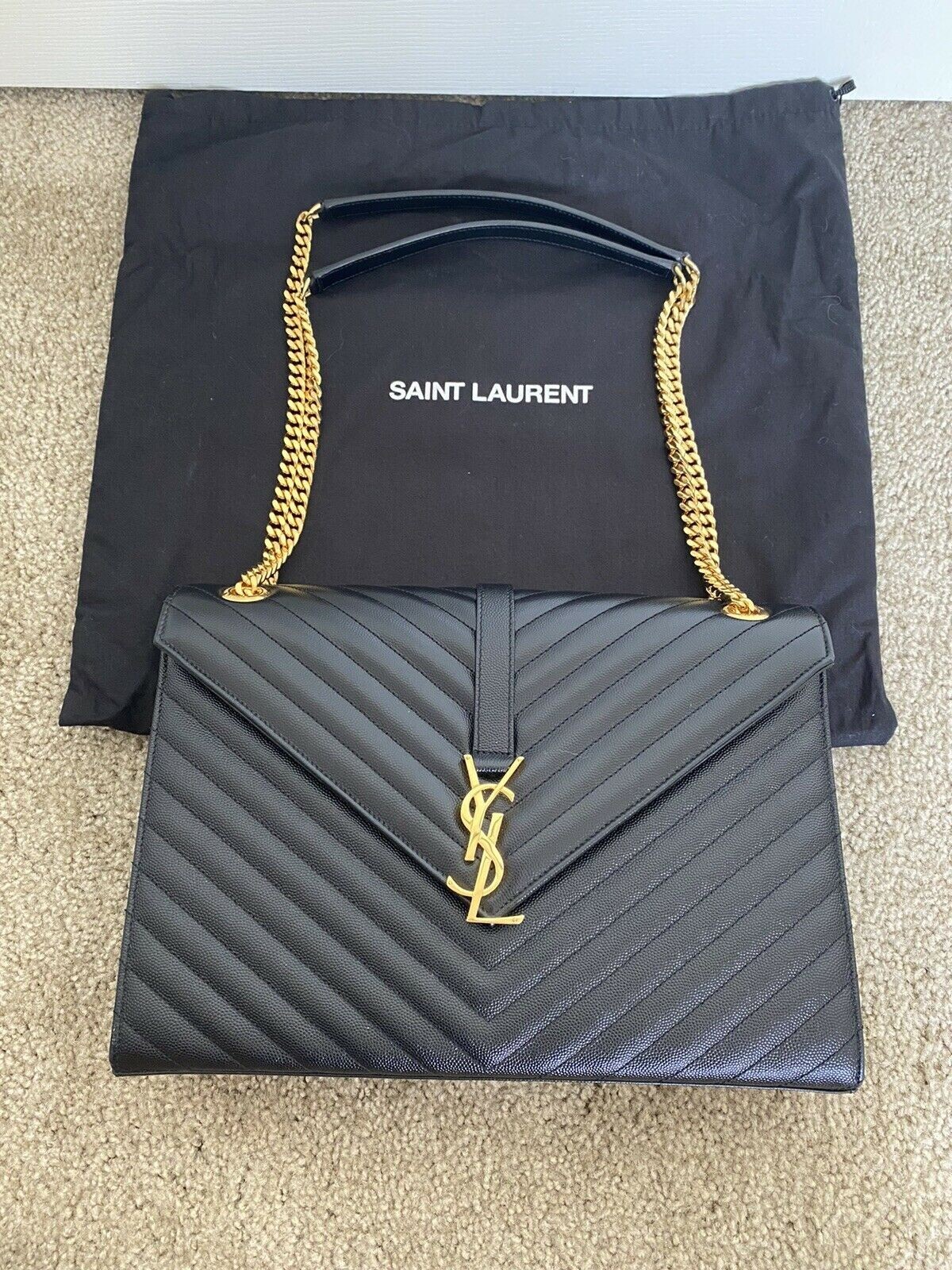 Authentic Yves Saint Laurent black cowhide ENVELOPE C… - Gem