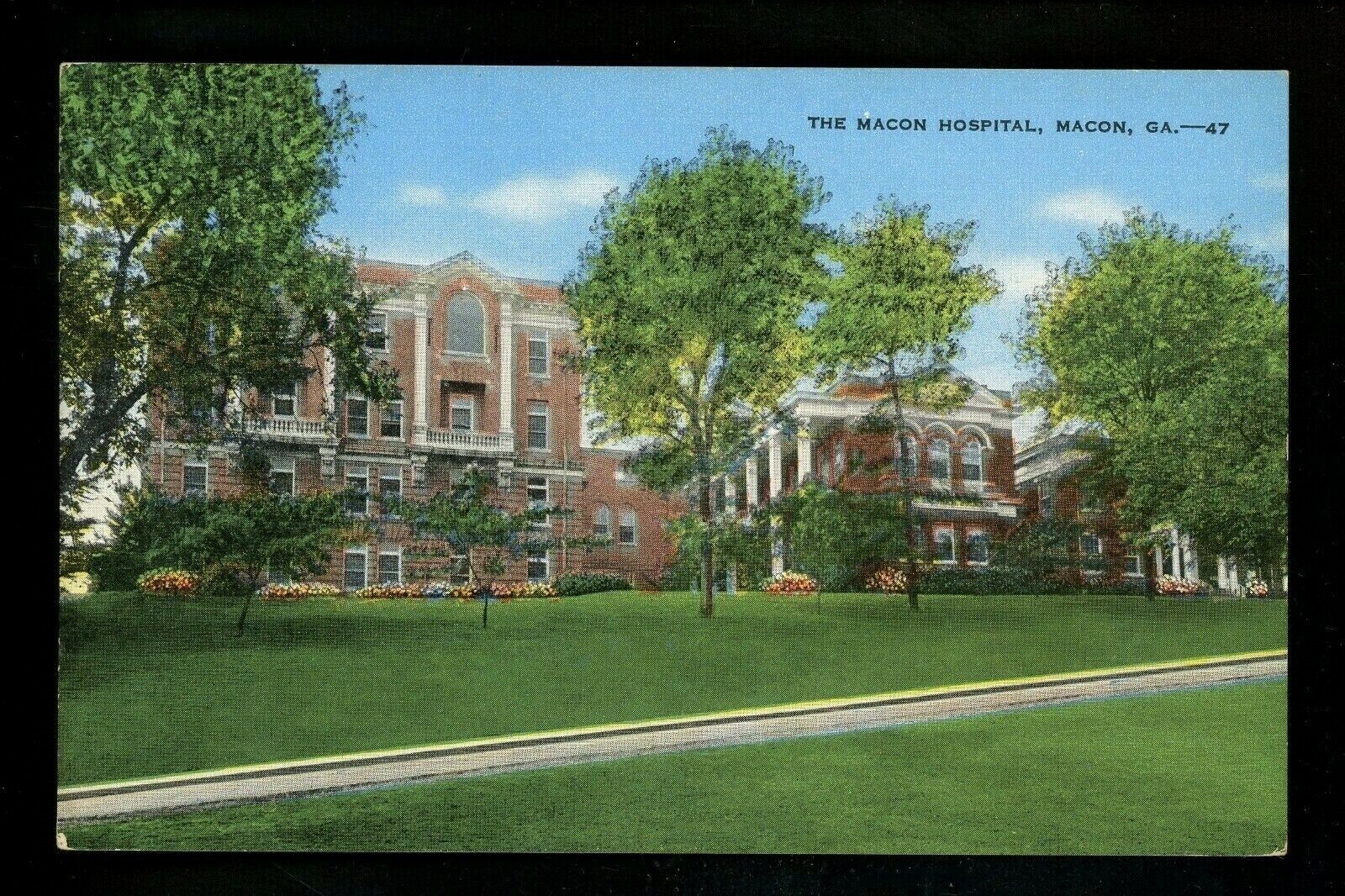 Georgia GA postcard Macon Macon Hospital lawn trees balcony flowers ...