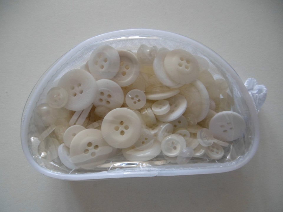 Buttons in clear zip pouch various sizes and colours approx 200 per bag ...
