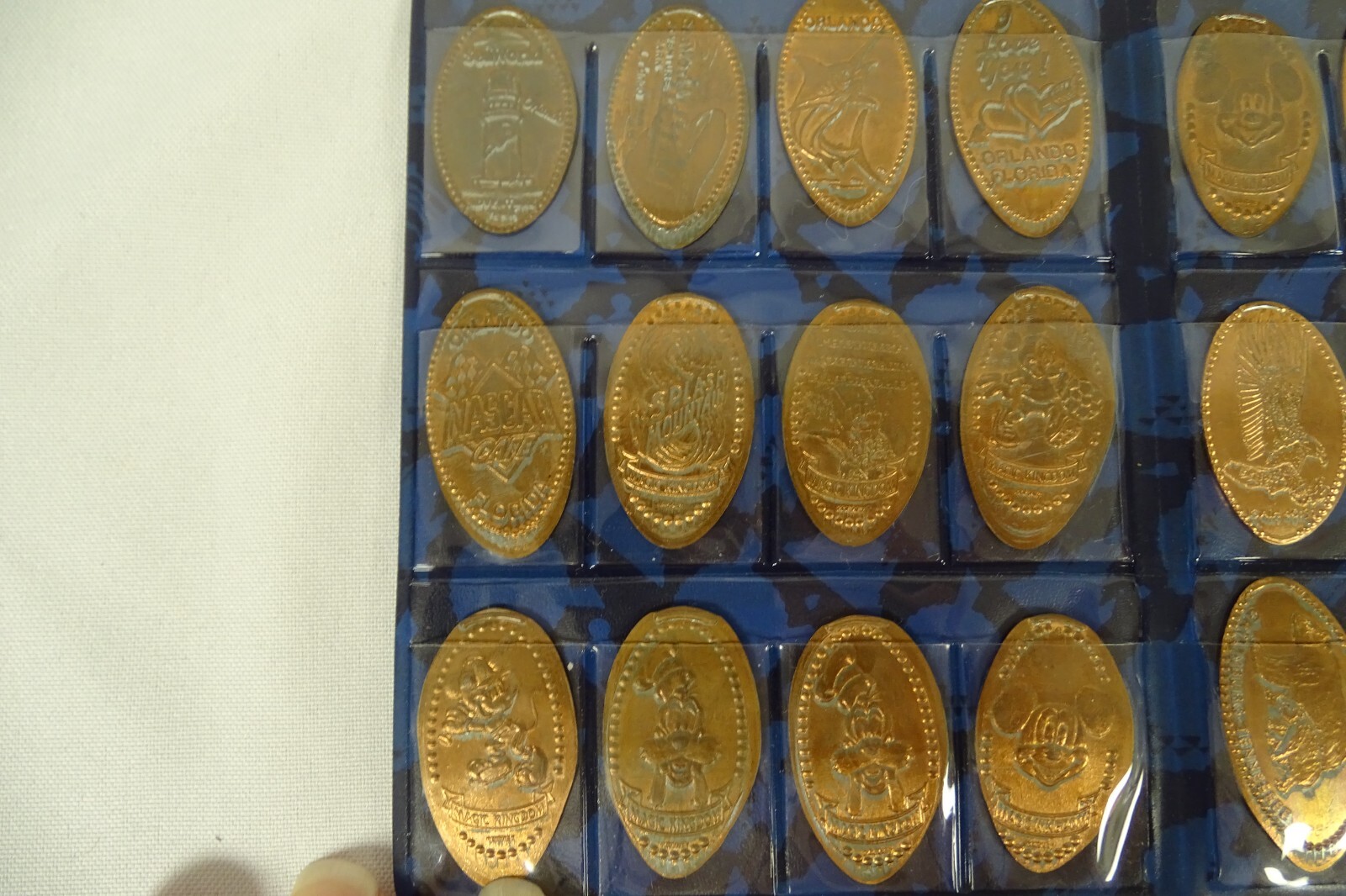 Disneyland Penny Press Collection w/ The Collector’s Penny Press Wallet ...