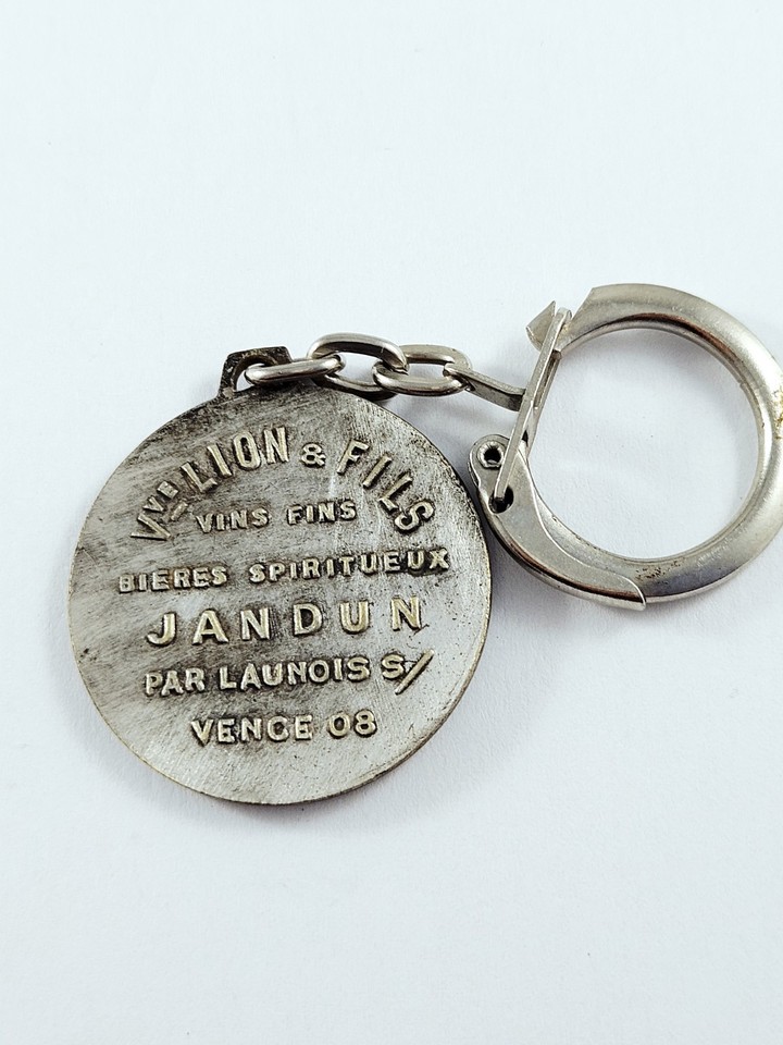 Keychain - Wines Lion & Sons - Jandun, Engraving Monk - Vintage Metal ...
