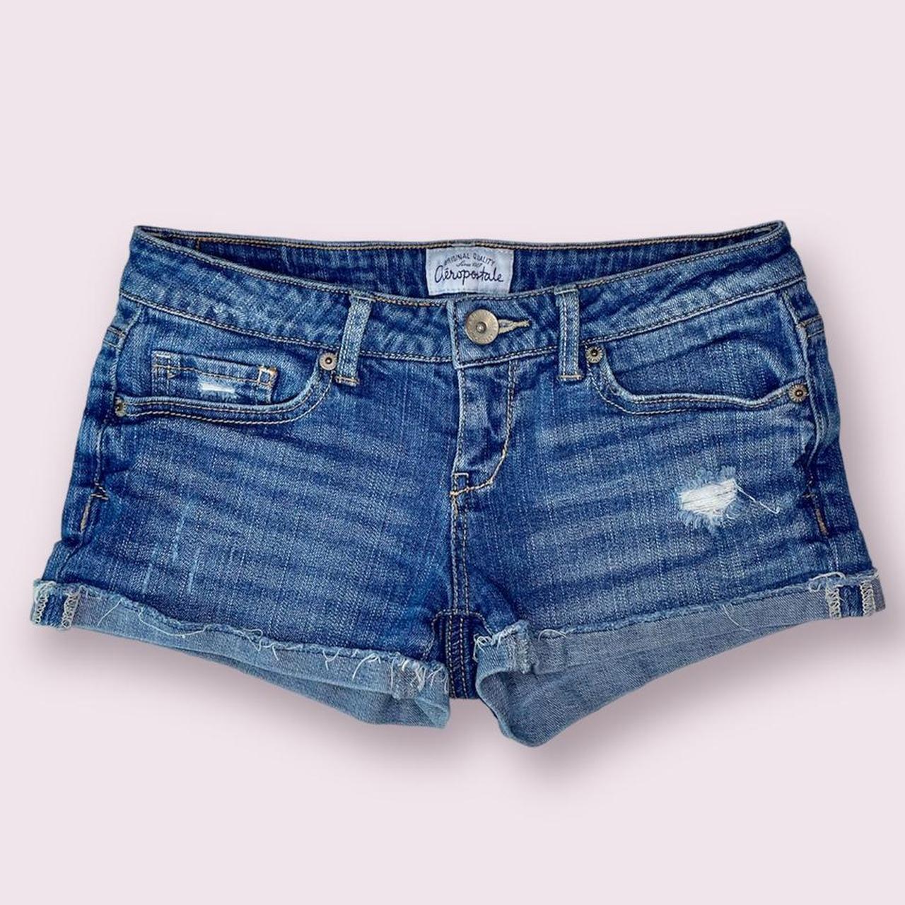 medium wash distressed y2k low rise denim booty short… - Gem