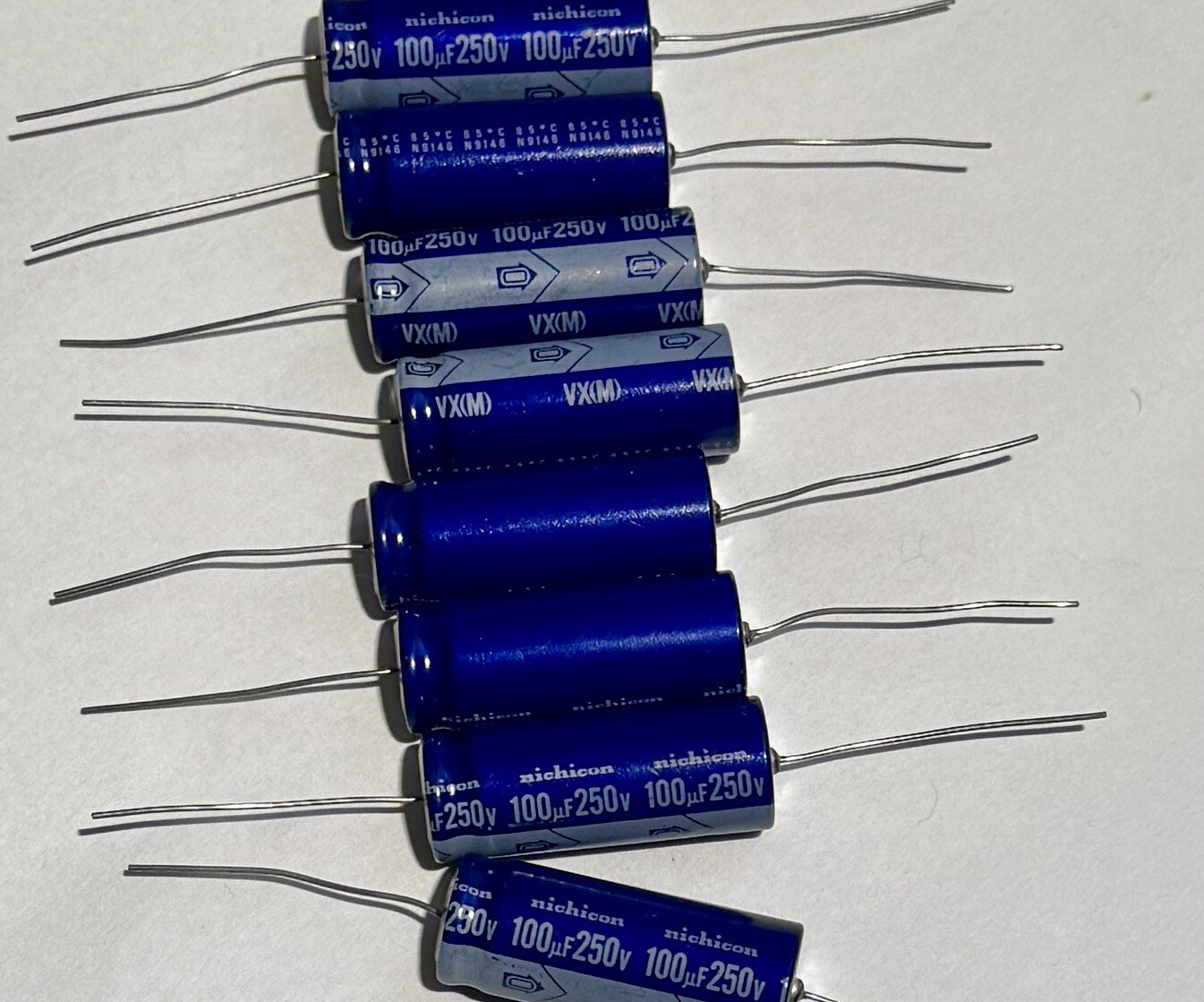 LOT OF 10 NICHICON 100uF 250V 85C Aluminum Axial Electrolytic Capacitor ...