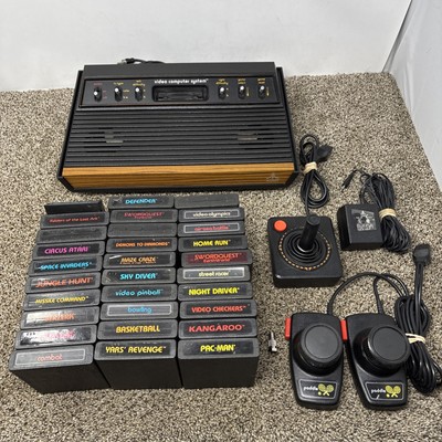 Atari 2600 System Bundle with Console, 30 Games, Joystick, Paddles, and ...