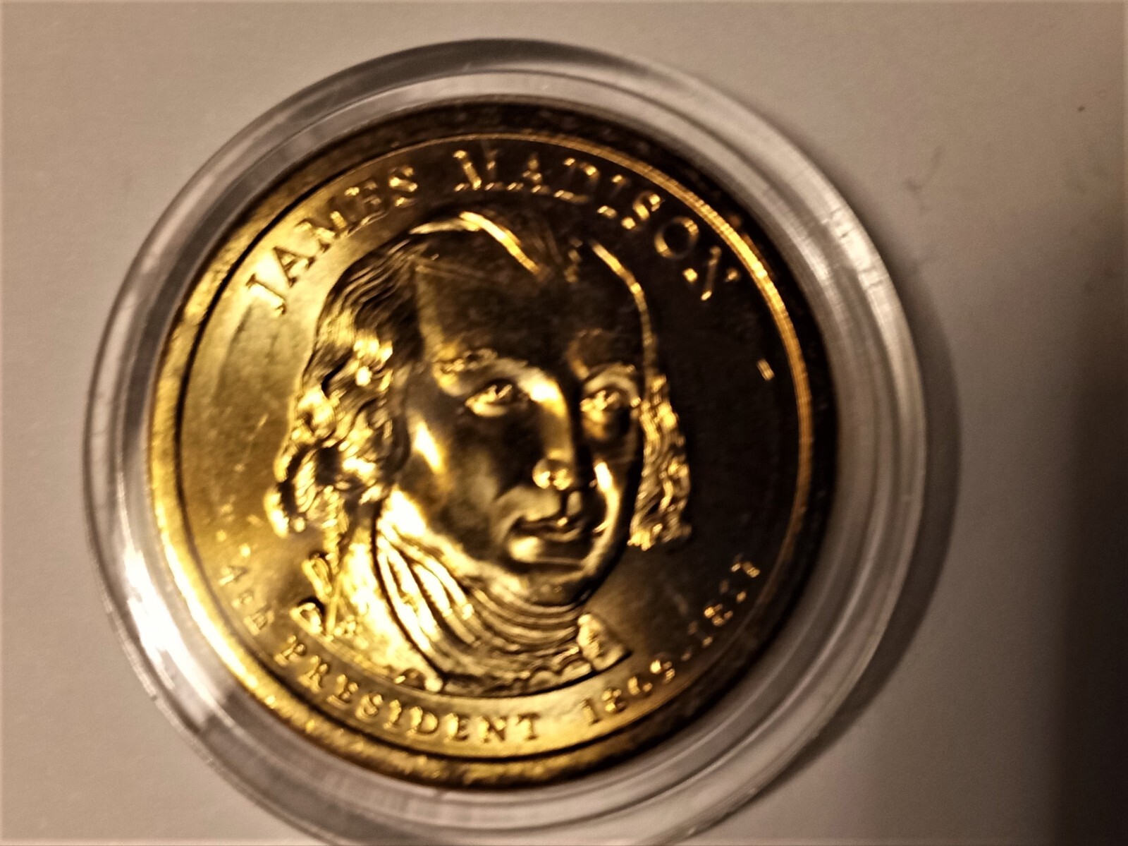 James Madison Dollar Coin 1809-1817. In a capsule uncirculated ...