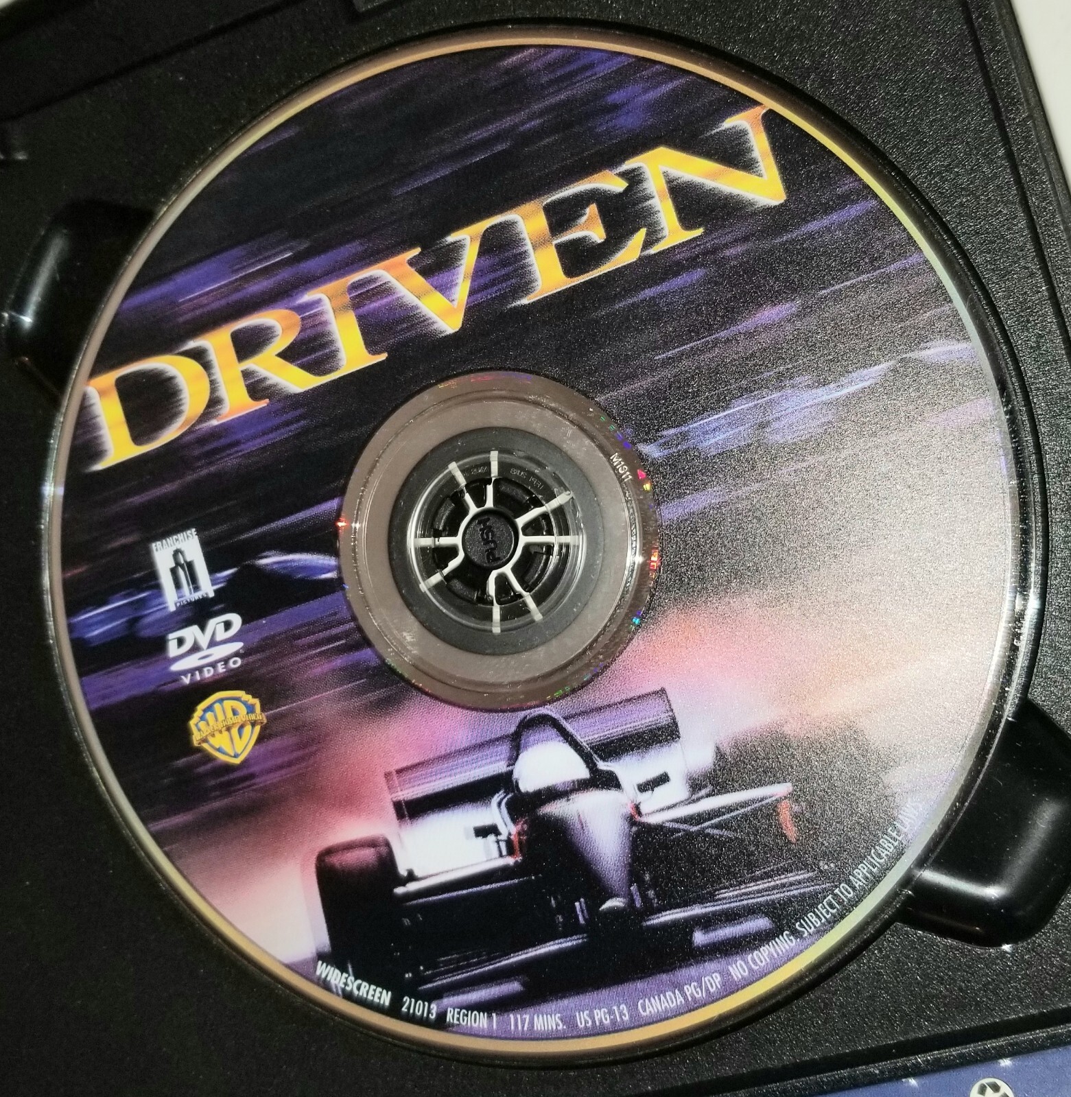 Driven DVD. Movie. PG-13. DVD 1. Commentary, Behind The Scenes Features ...