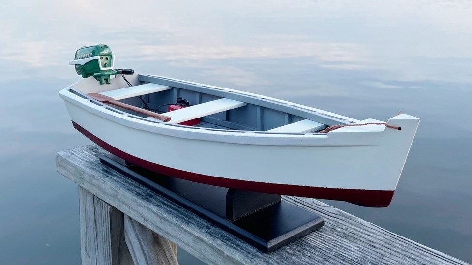 WOODEN SKIFF MODEL, 17.50 INCHES LONG, WITH GREEN 1955 JOHNSON 10HP ...