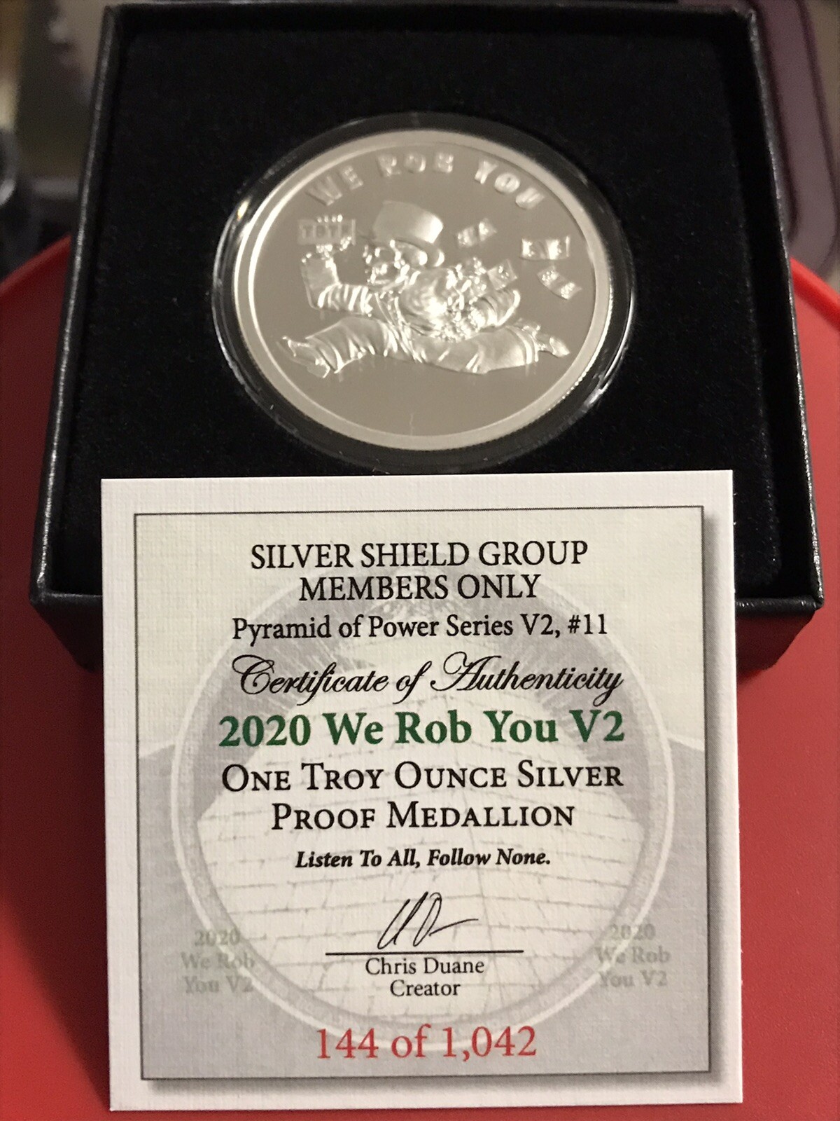 1 OZ .999 PURE SILVER SHIELD PROOF WE ROB YOU V2 MEMBERS ONLY ROUND ...