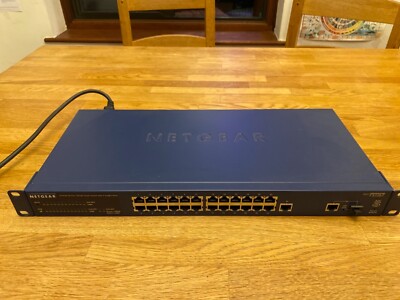 NETGEAR FS726T prosafe 24 port 10/100 smart switch with 2 Gigabit ports ...